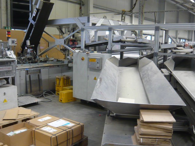 Merchandise sorting- and placing machine for foil packaging machines ...