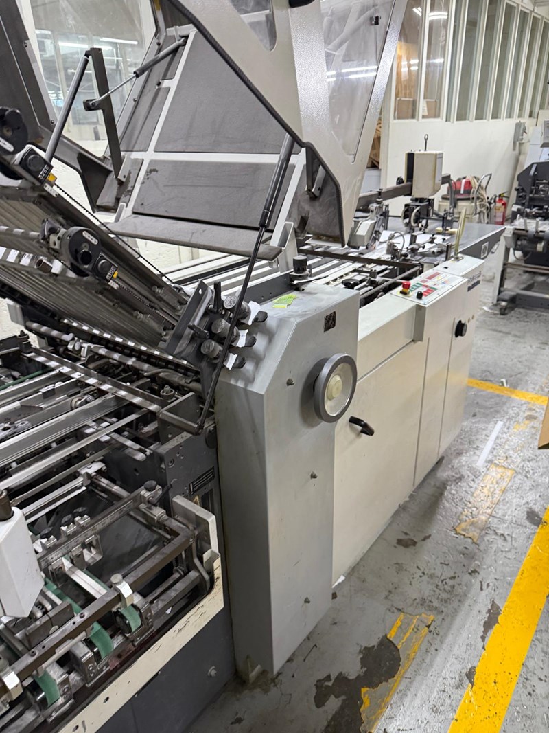 2006 STAHL FOLDER , CONTINUOUS FEED WITH CONVEYOR, & KNIFE FOLD ...