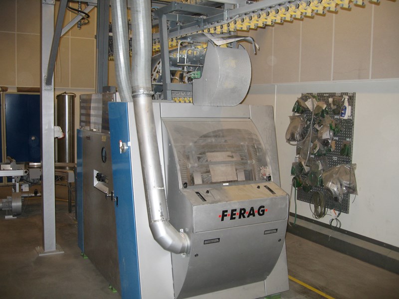 Ferag SNT-U trimmer with block feeder | pressXchange