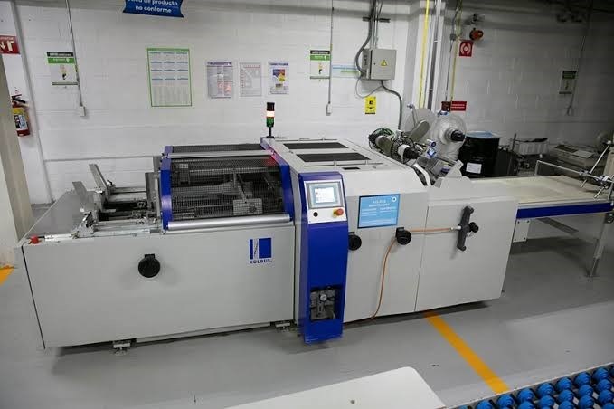 Kolbus SWM 400 magnet inserter | pressXchange