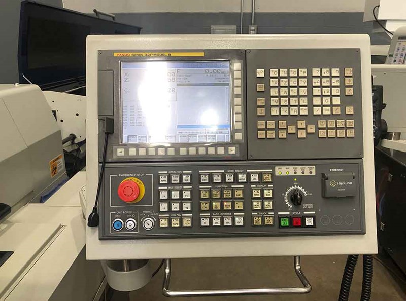 Hanwha XD32II CNC Lathe with Feeder | pressXchange