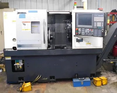 OKUMA GENOS L400 2-AXIS CNC TURNING CENTER LATHE | pressXchange